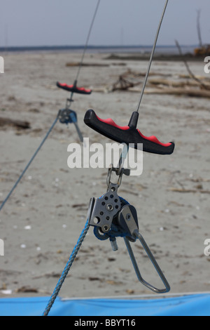Hook of a trapeze of a sail boat on a beach Stock Photo - Alamy