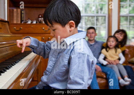 Korean boy playing piano Stock Photo - Alamy