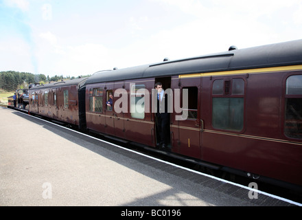 Old steam locomotive and carriages Stock Photo - Alamy