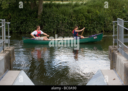 canadian canoeists fish pass canoeing canoe river medway kent england ...