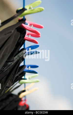 Colourful pegs on a washing line in a garden in Chalki, Greece Stock ...