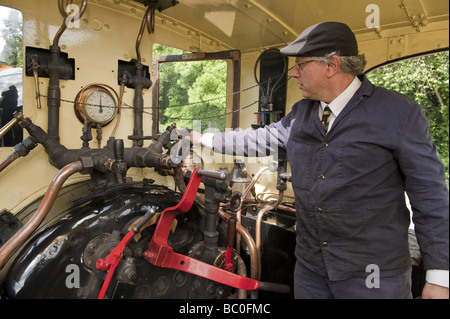Fireman and driver of "The Earl" steam engine in conversation at ...