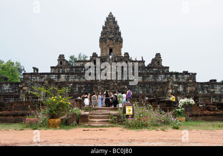 Tourists are visiting the Bakong temple ruins, Angkor, Siem Reap ...