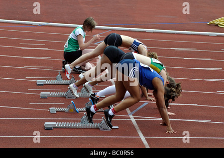 Female sprinters in the starting blocks of the HS Girl's 55m at the ...