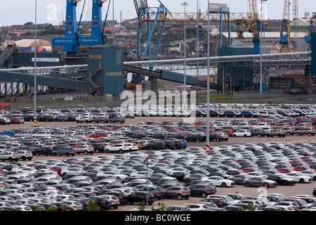 Lines of cars wait to be loaded onto ship for export from the UK Stock ...