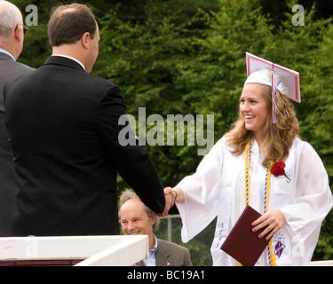 Graduation diploma, handshake and student in success, achievement and ...