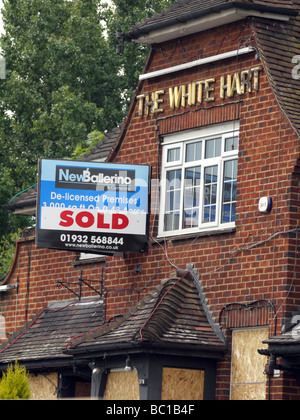 White Hart pub in Chessington Surrey UK with a sold sign de-licenced ...