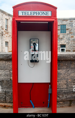 A red British telephone box, with King's Crown, at Beaulieu, Hampshire ...