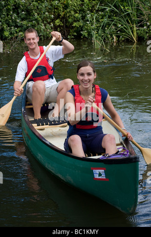 canadian canoeists fish pass canoeing canoe river medway kent england ...