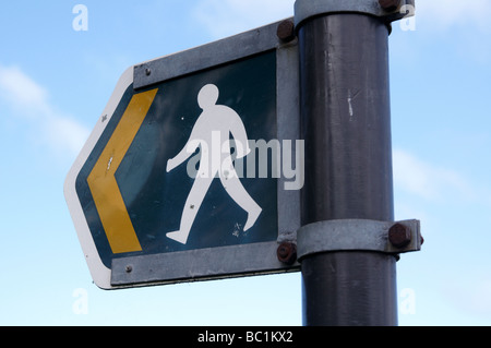 The green man 'walking' sign on a British pedestrian crossing near ...