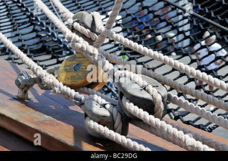 Close up of the blocks, ropes, pulleys and other equipment that is used ...