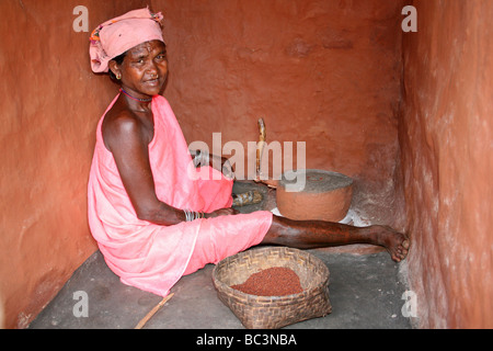 Elderly Indian Adivasi woman (Orissan tribal woman) with one golden ...
