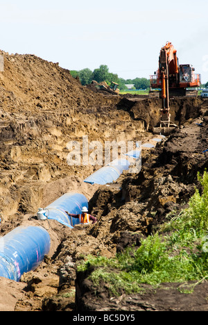Workers laid water system pipeline at construction site. City ...