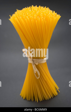 a bundle of raw spaghetti Stock Photo - Alamy