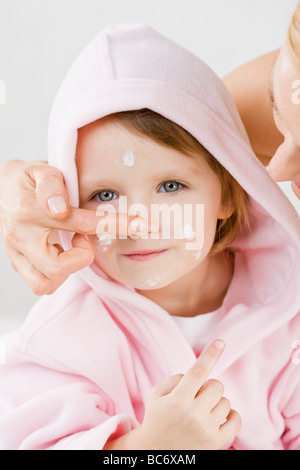 Applying cream and rubbing into skin, cosmetology relaxing procedure ...