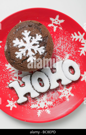 Chocolate muffin and the word HOHO on festive plate Stock Photo - Alamy