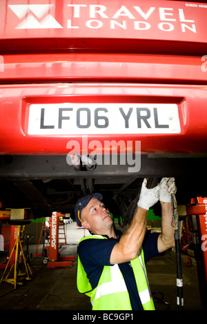 bus mechanic technician fix double decker London Stock Photo - Alamy