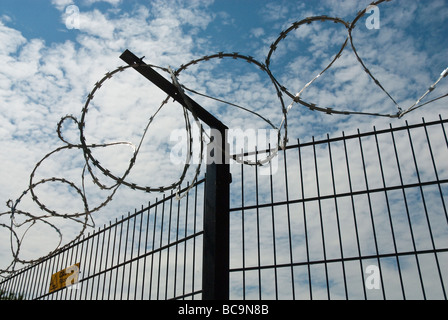 Razor wire fencing security fence on property wall, Condesa, Mexico ...