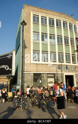 Alfresco drinkers outside The Foundry bar in Shoreditch, London, EC2 ...