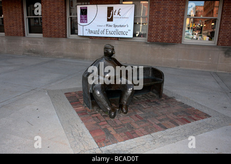 A bronze sculpture of a fat man Stock Photo - Alamy