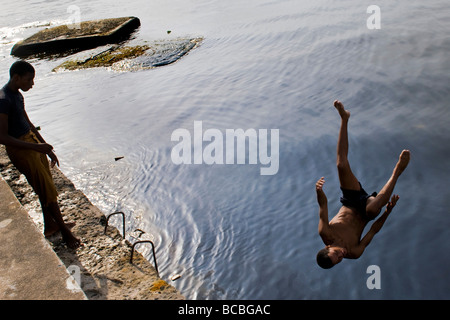 Cuban boys swimming at the Malecon Stock Photo: 4354757 - Alamy