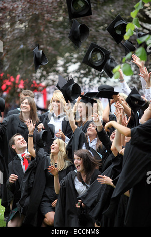 Degree Students Throw Their Mortar Board Hats In The Air At Their ...