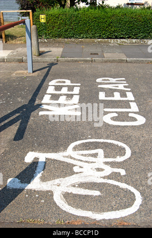 Road marking. Keep clear instruction Stock Photo - Alamy