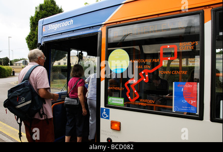 Passengers boarding a Stagecoach operated bus in Cheltenham ...
