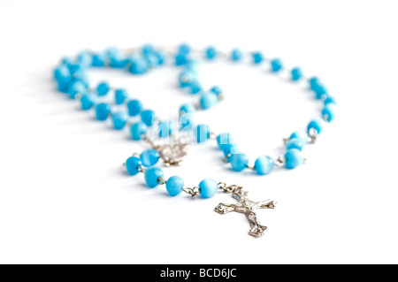 pale blue rosary beads on a white background Stock Photo - Alamy