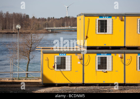 Construction site with temporary yellow barracks for construction ...