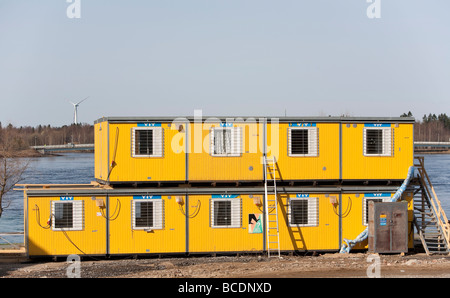 Construction site with temporary yellow barracks for construction ...