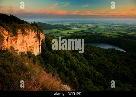 Whitestone Cliff and Lake Gormire at summer sunset on the Cleveland Way ...