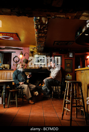 open fire in a traditional english country pub Stock Photo - Alamy