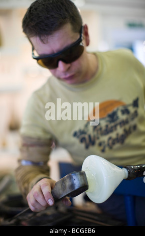 Colin Hawkins, glass blower at the Loco glass studio creating blown ...