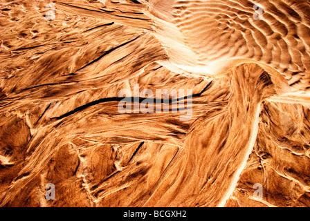 Patterns created by sea erosion on rocks at Rumbling Kern, near Howick ...