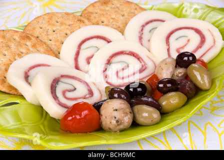 An assortment of yummy snacks: cheese, crackers, chips, fruits, and ...
