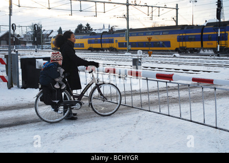 Snow Covered Railway Tracks and Stationary Trains Seen in Falling Snow ...