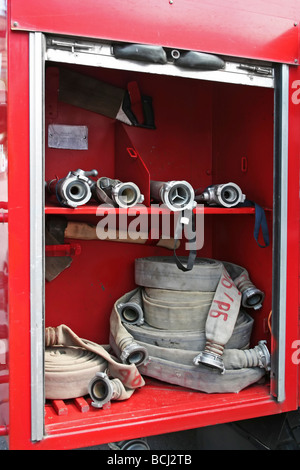 Fire station with fire engine hose hydrant and valves Stock Photo - Alamy