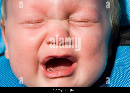 Close up child crying with tearful on face. Kid crying with a tear on ...