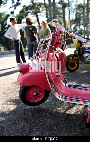 Classic antique pink Piaggio Vespa scooter, circa mid 1960s. Da Lat ...
