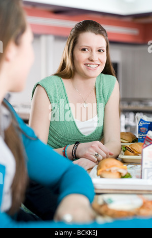 Female school students having lunch Stock Photo - Alamy