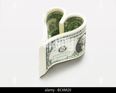 dollar bill in the shape of a heart Stock Photo - Alamy