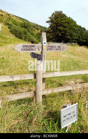 Waymarker for National Trust rural walk with sign forbidding cycling ...