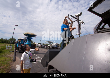 Members of Project Vortex 2 attach weather instrumentation to the ...