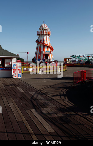 Amusement arcade and helter skelter on Clacton on Sea pier in England ...