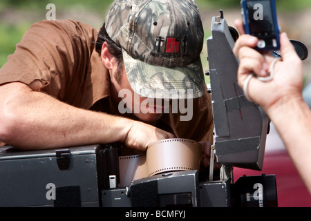 Sean Casey s IMAX team loads film into an IMAX camera during Project ...
