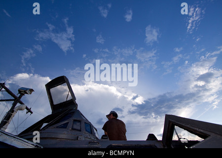 Storm Chaser and IMAX videographer Sean Casey sits on TIV during ...