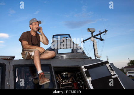 Storm Chaser and IMAX videographer Sean Casey sits on TIV during ...