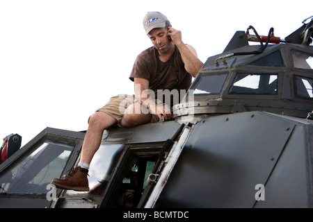 Storm Chaser and IMAX videographer Sean Casey sits on TIV during ...