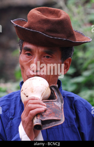 Man playing Conch Shell Trumpet - used by ancient fish sellers of ...